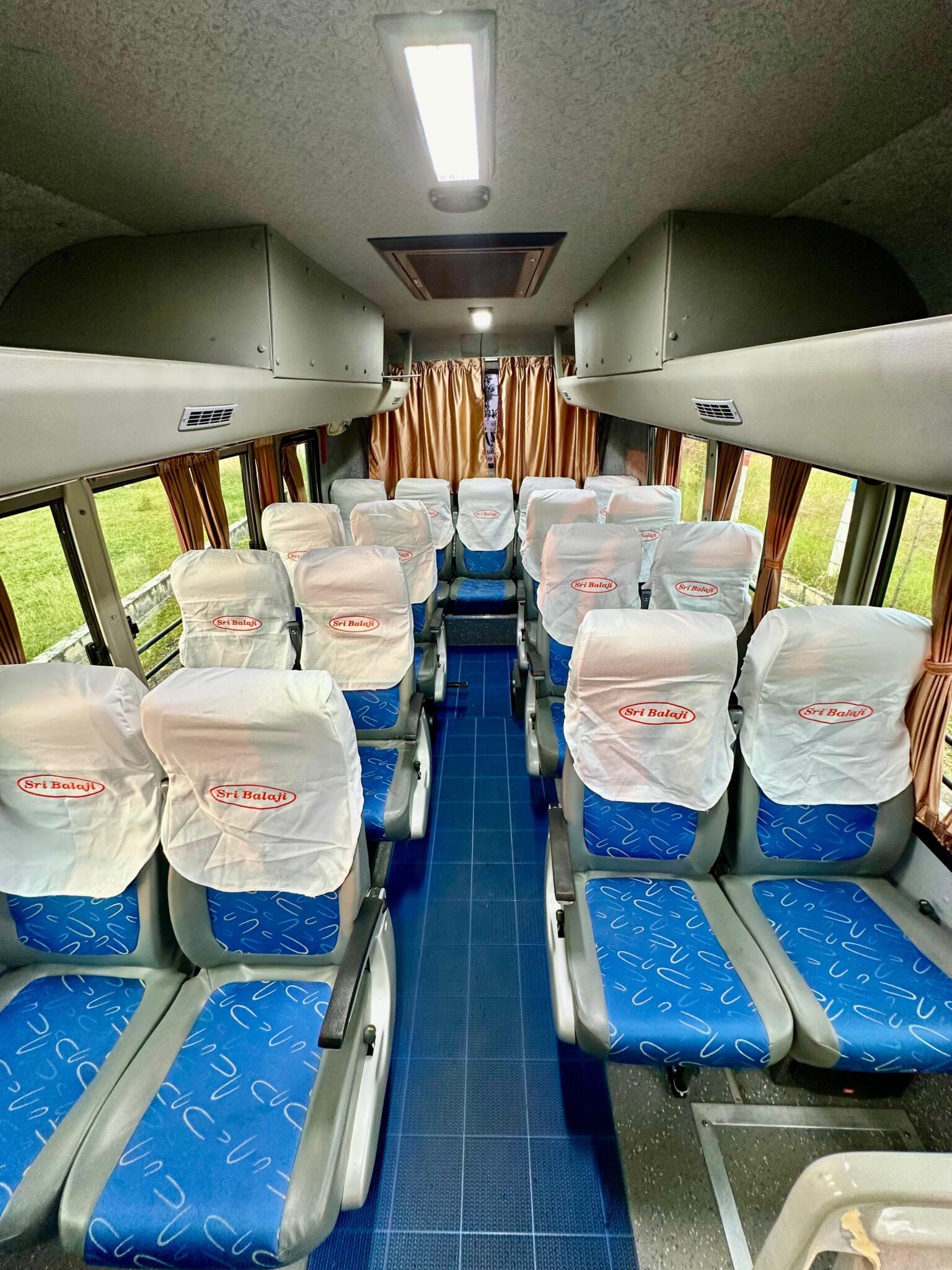 Rent a 25 Seater Mini Bus in Coimbatore | Starts ₹20/Km
